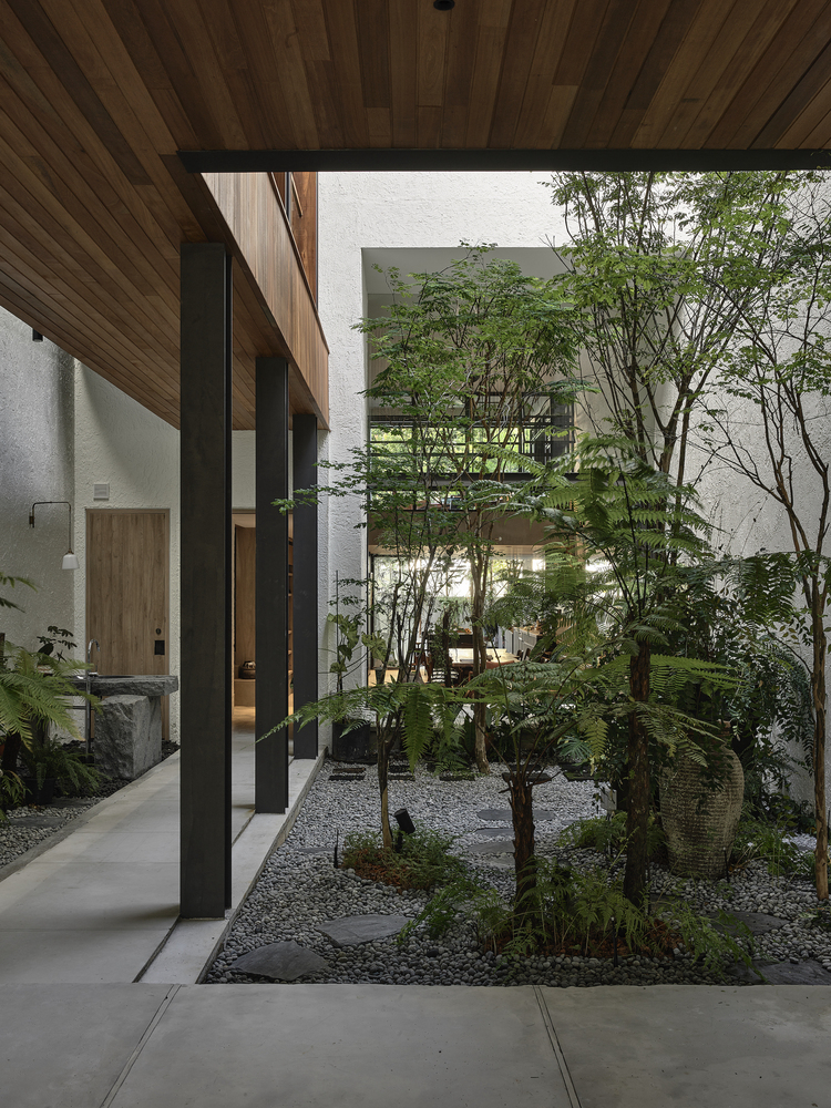 oku house is a layered sanctuary shaped by air, light, and privacy ...
