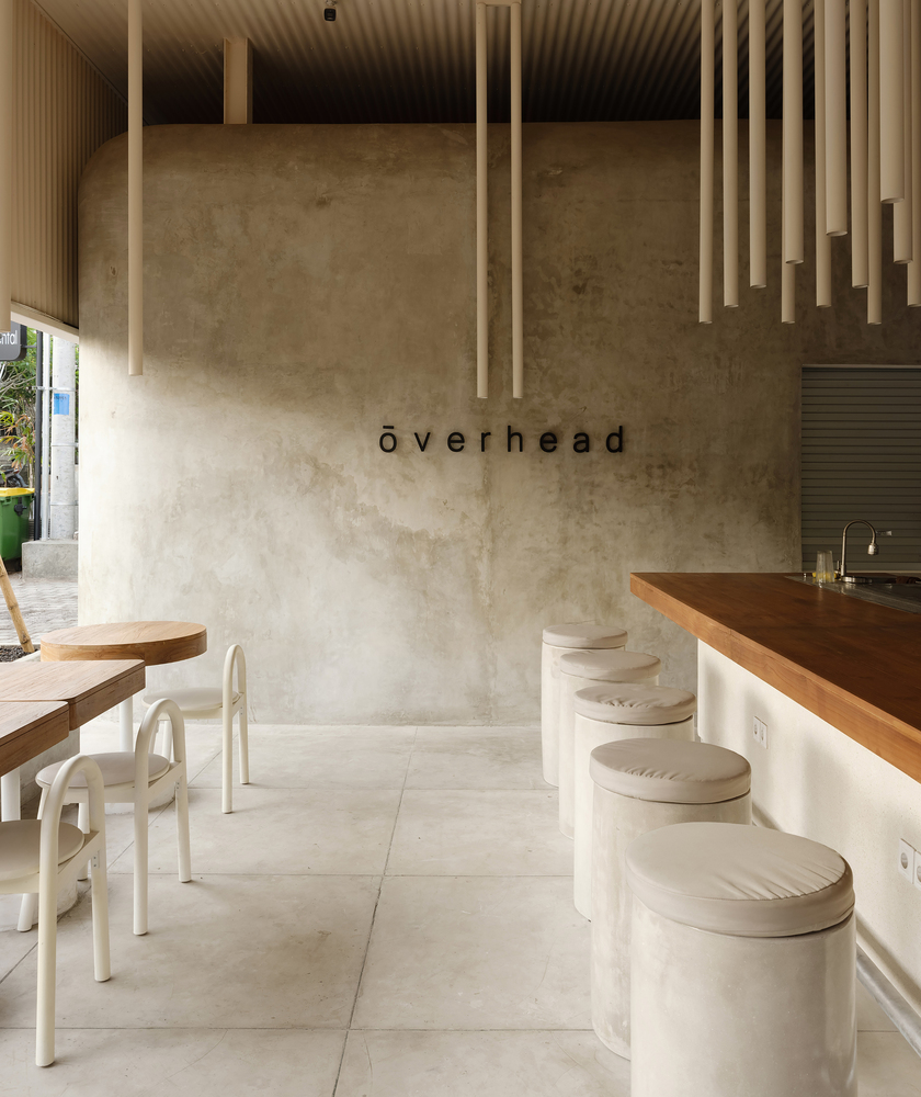 overhead restaurant promotes indoor-outdoor connection with wallless ...