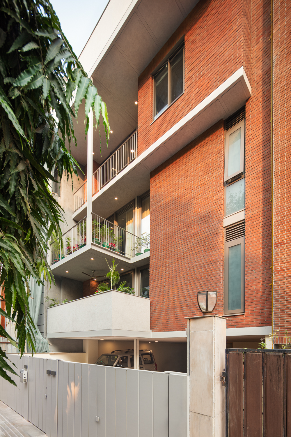 reimagining the archetype of poorly-lit row-houses: stacked house ...