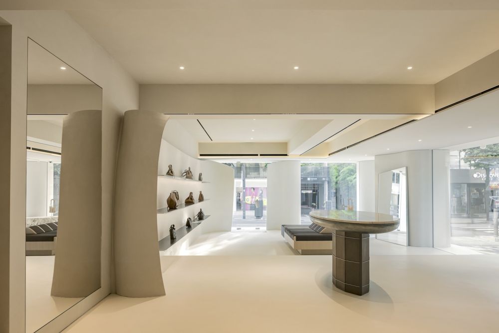 curved and fluid interiors redefine minimalism at polène paris seoul ...