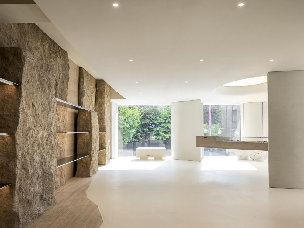 curved and fluid interiors redefine minimalism at polène paris seoul ...