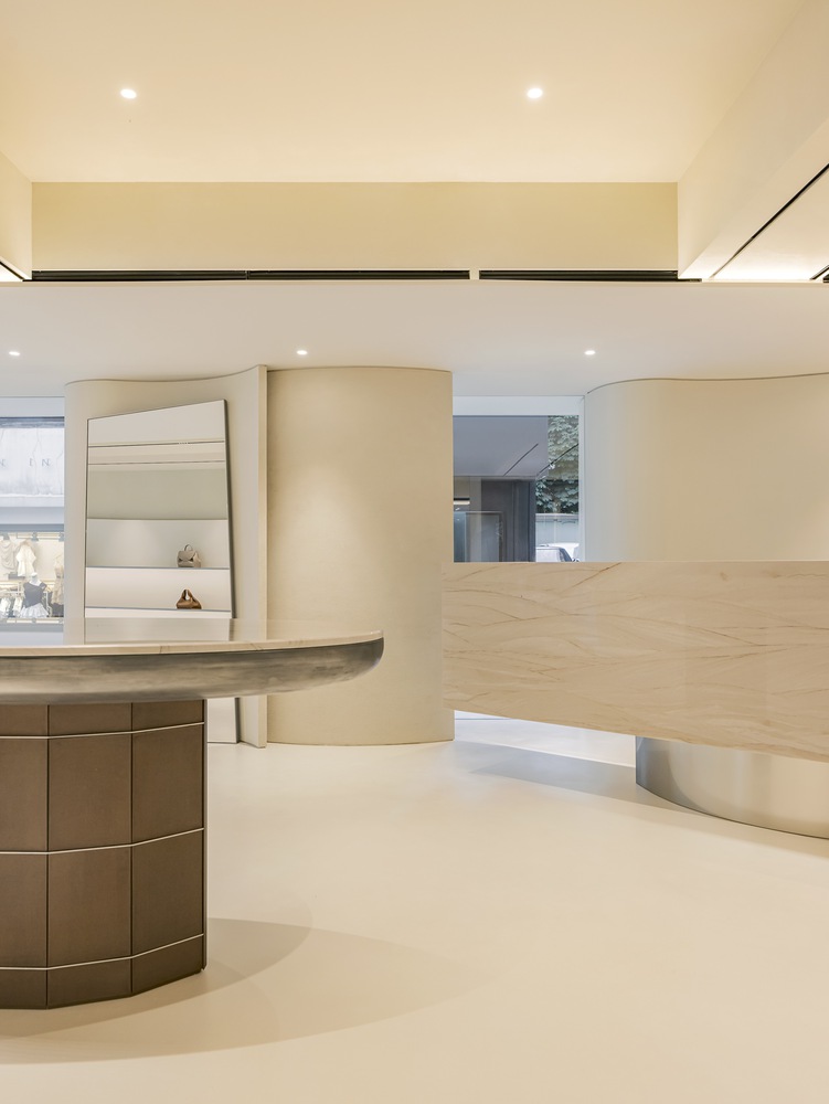 curved and fluid interiors redefine minimalism at polène paris seoul ...