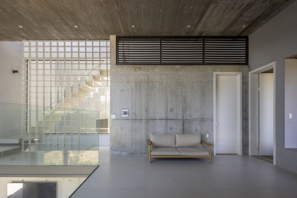 pvt house combines raw concrete and nature for peaceful contemporary ...