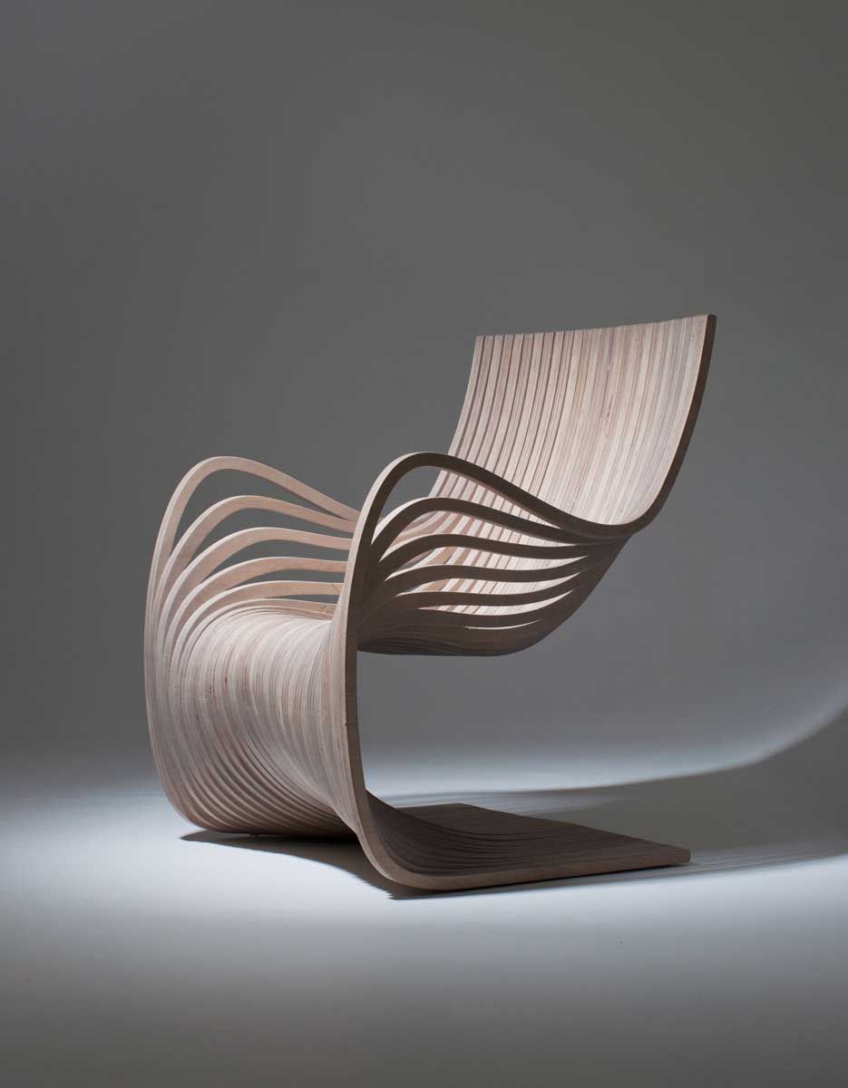 news: 8 sculptural chairs entirely made of wood | the design story