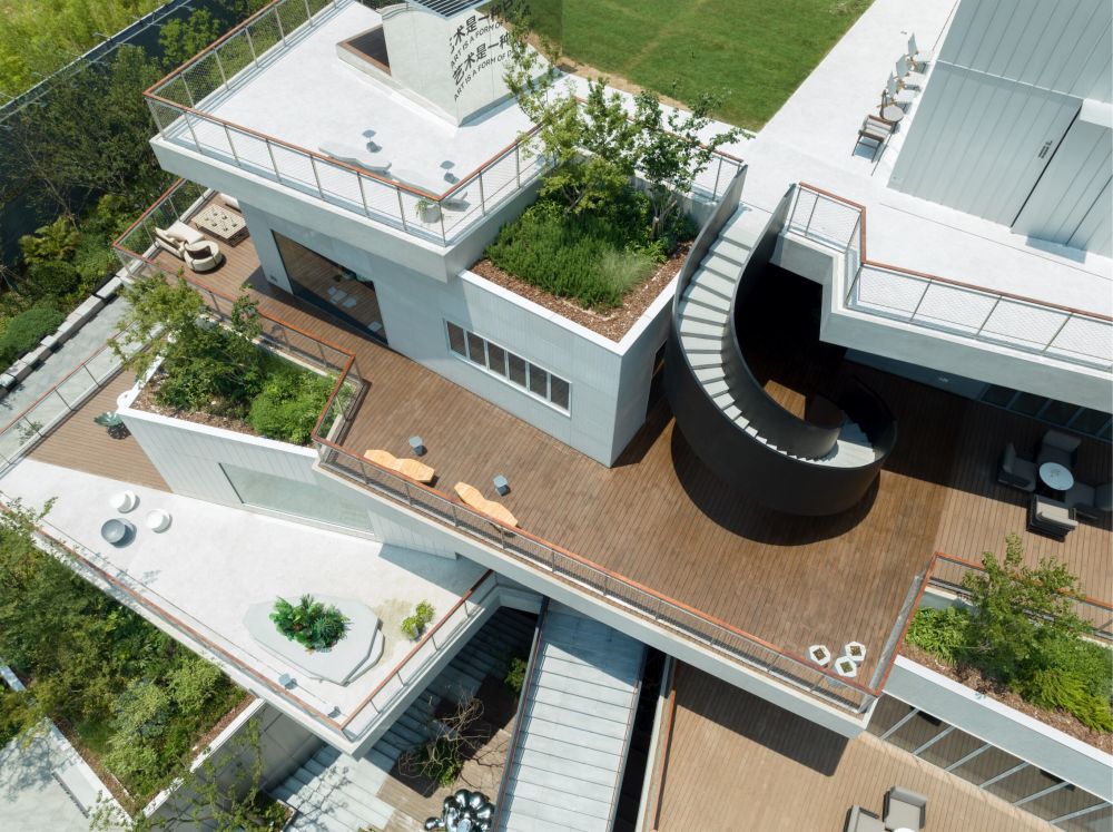 b.l.u.e architecture studio redefines community spaces through stacked ...