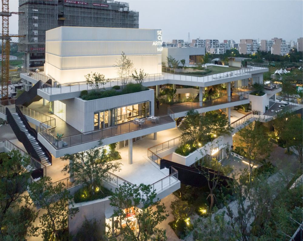 b.l.u.e architecture studio redefines community spaces through stacked ...