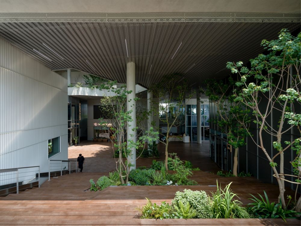 b.l.u.e architecture studio redefines community spaces through stacked ...