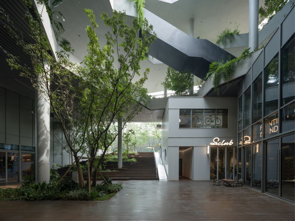 b.l.u.e architecture studio redefines community spaces through stacked ...