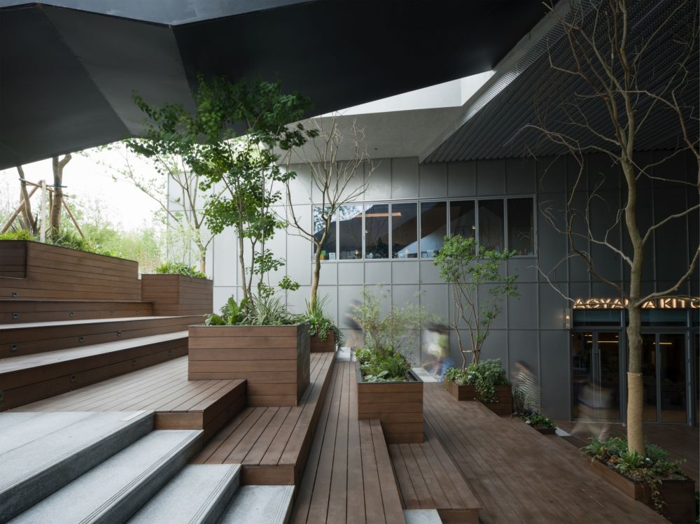 b.l.u.e architecture studio redefines community spaces through stacked ...
