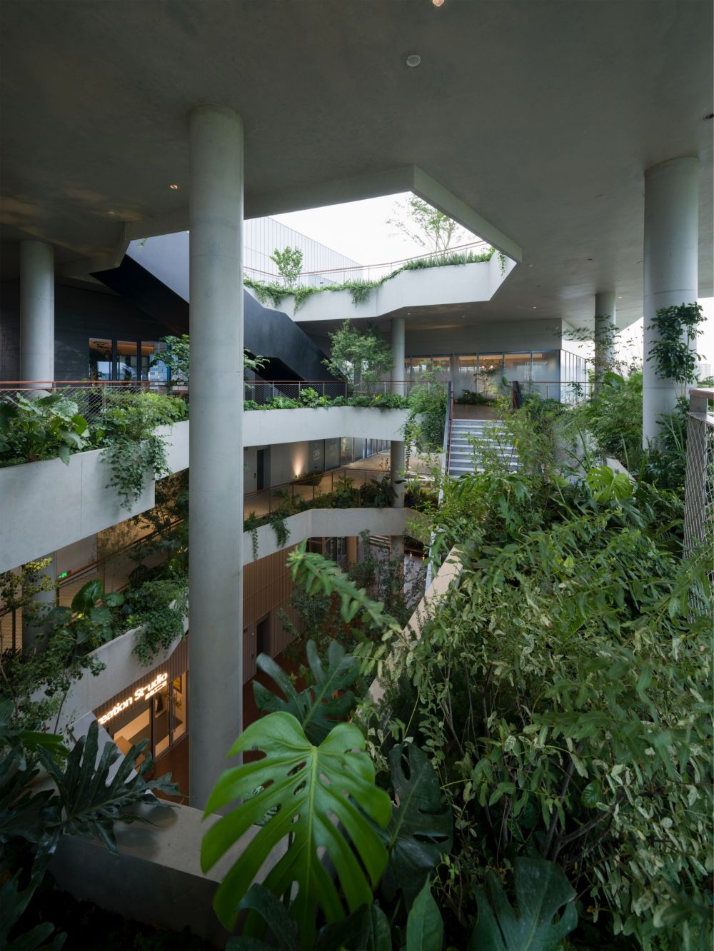b.l.u.e architecture studio redefines community spaces through stacked ...