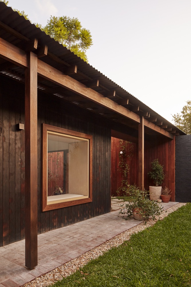 shadow house accentuates luminous serenity with wood and natural light ...