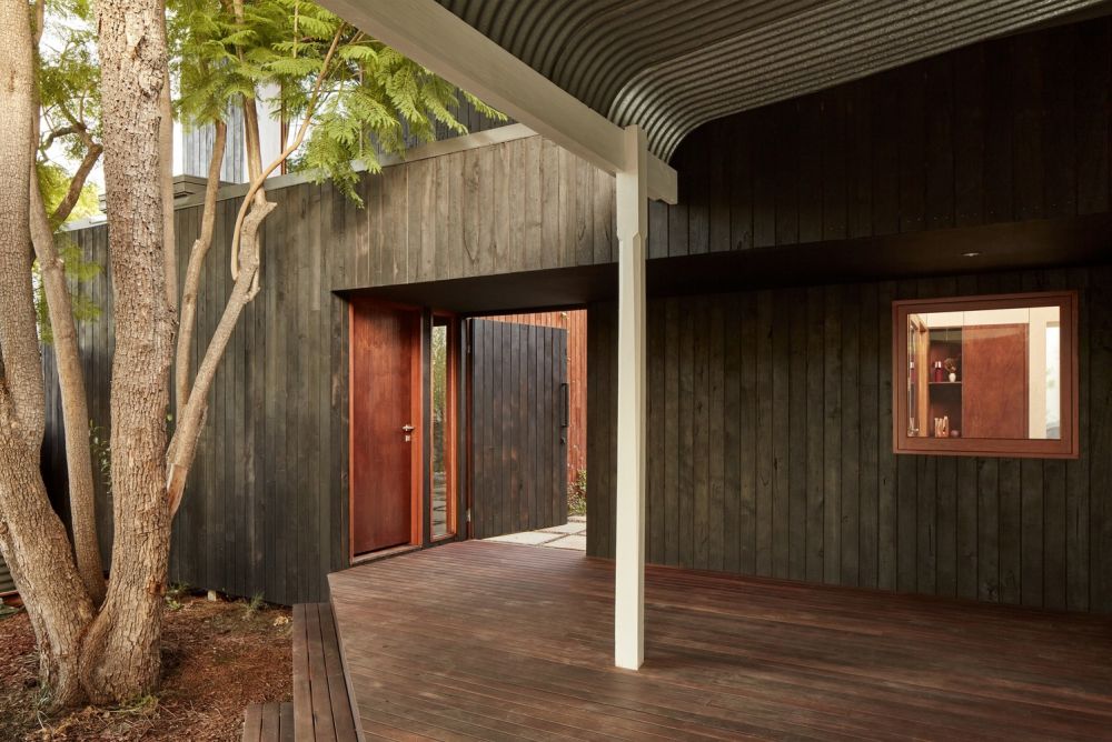 shadow house accentuates luminous serenity with wood and natural light ...