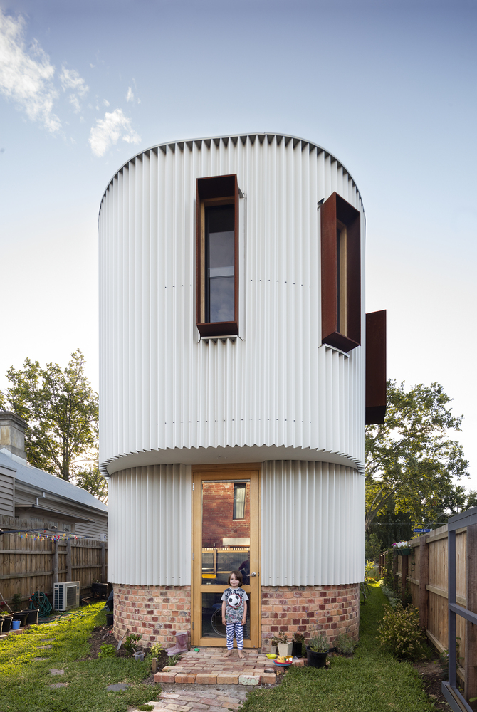 true north residence is a melbourne home wrapped in sinuous facade and ...