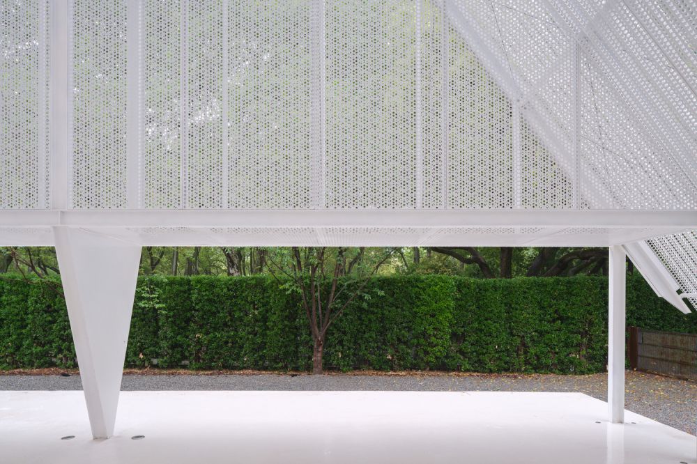 the breeze hall invites a moment of reflection through its feather ...