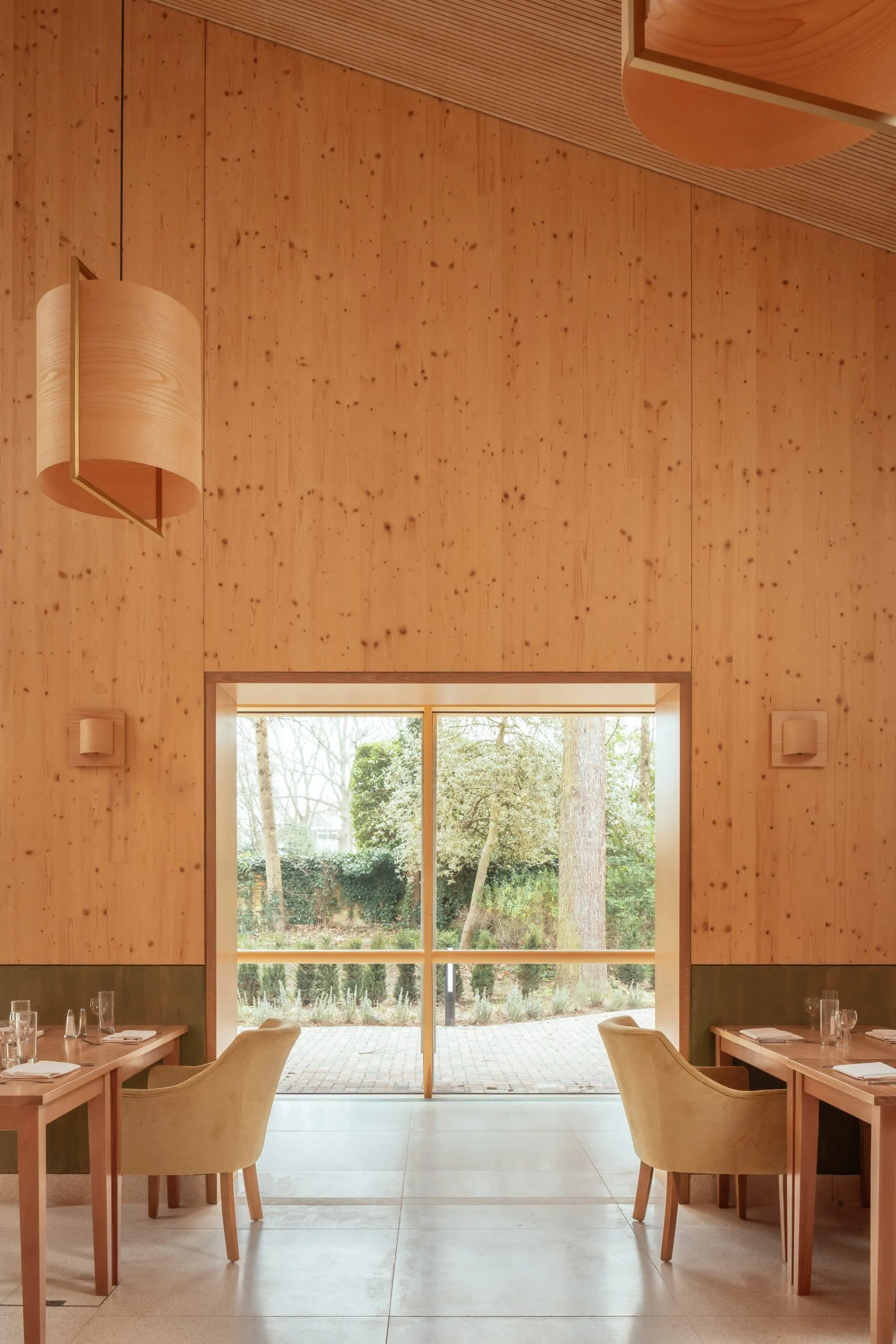 mae architects combines wood and bricks to accentuate warmth at john ...