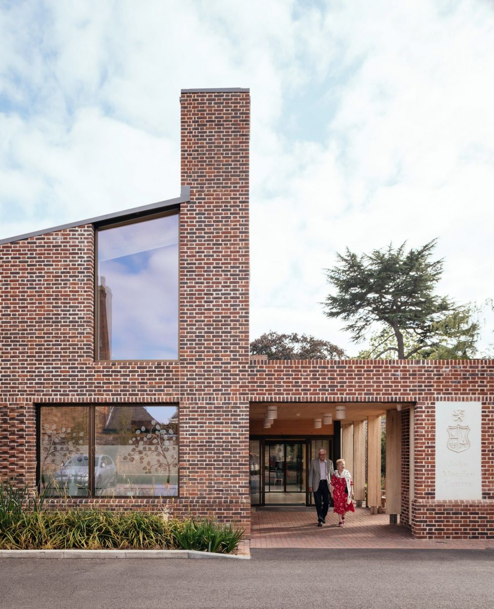 mae architects combines wood and bricks to accentuate warmth at john ...