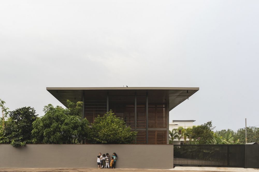 the slab house's open-air interiors and high ceilings generates ...