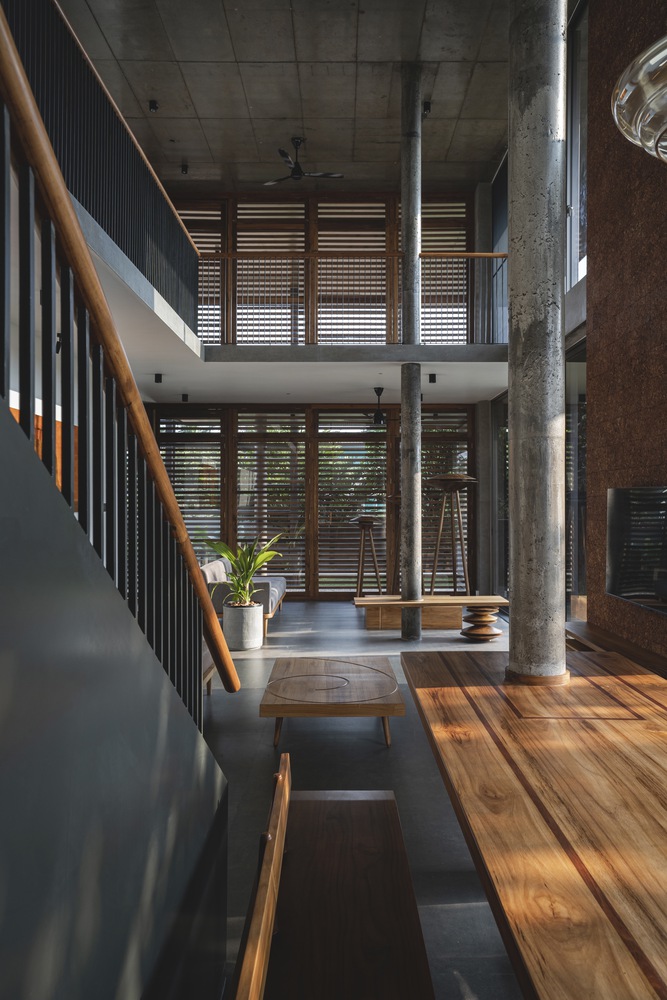 the slab house's open-air interiors and high ceilings generates ...