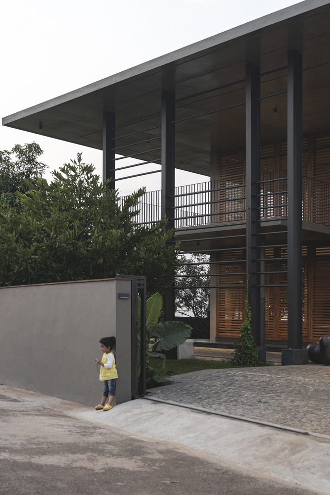 the slab house's open-air interiors and high ceilings generates ...