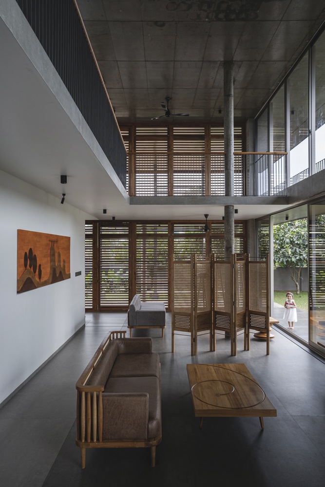 the slab house's open-air interiors and high ceilings generates ...