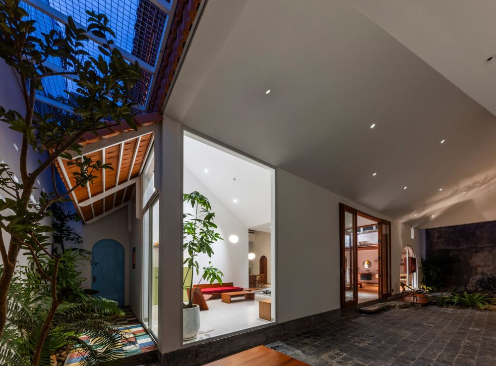 tile house exemplifies a harmonious unity of architecture and nature ...