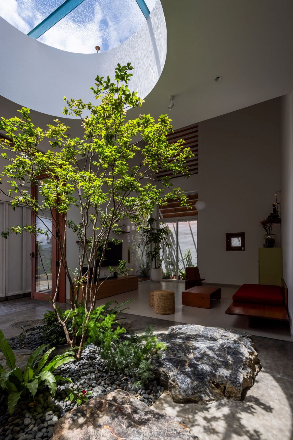 tile house exemplifies a harmonious unity of architecture and nature ...