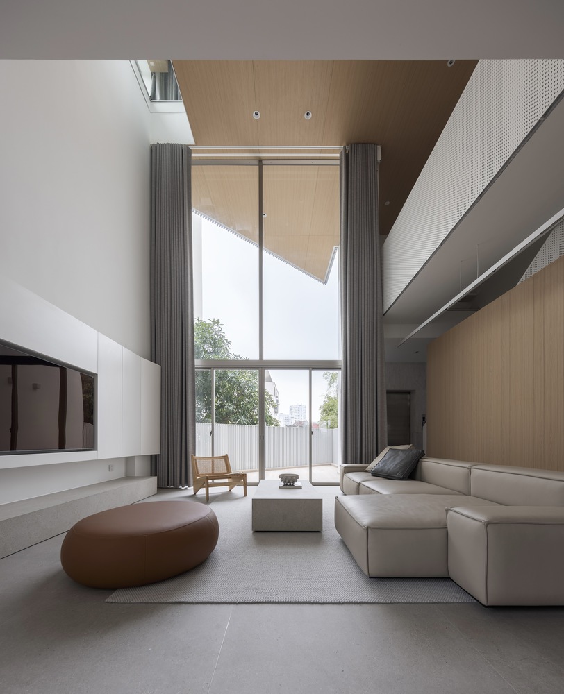 tram house redefines urban living in a white tower haven: project by ho ...