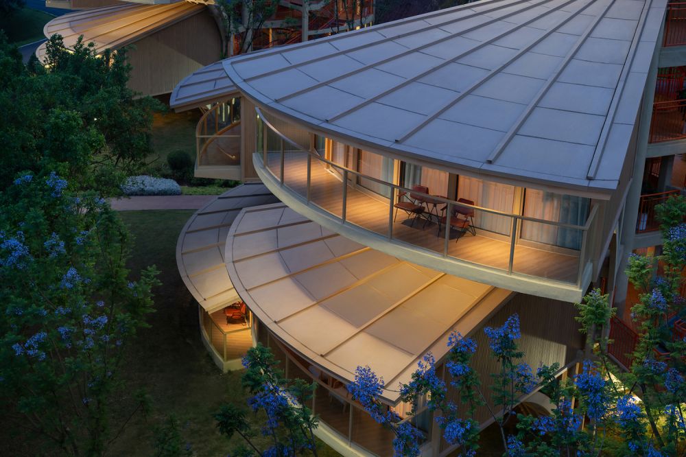 news: wh studio designs treehouse-like architecture with organic forms ...