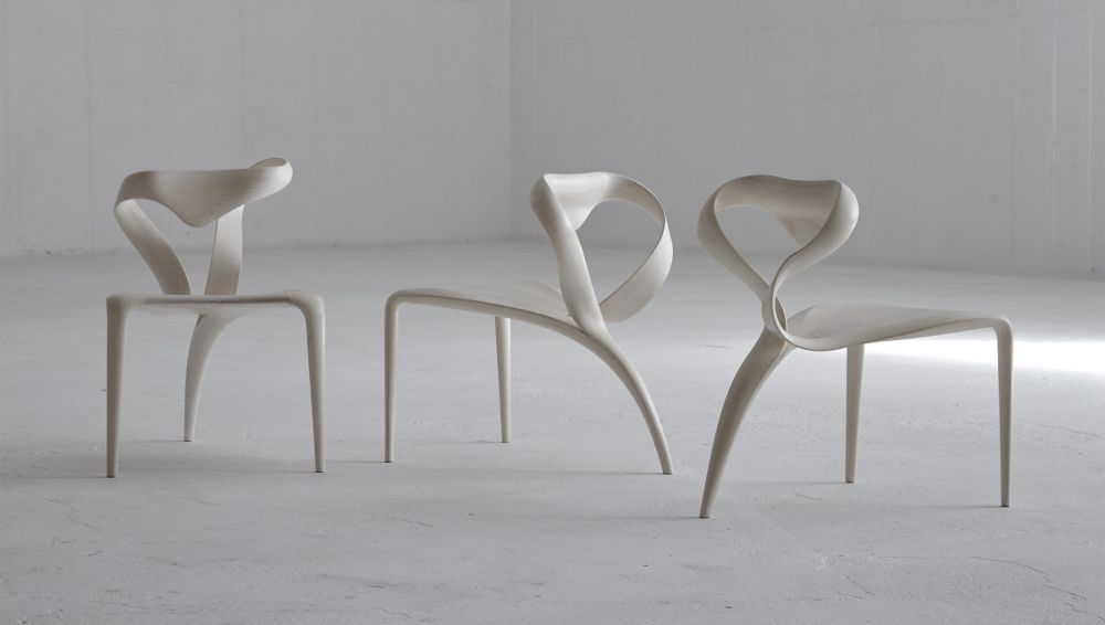 news: 8 sculptural chairs entirely made of wood | the design story