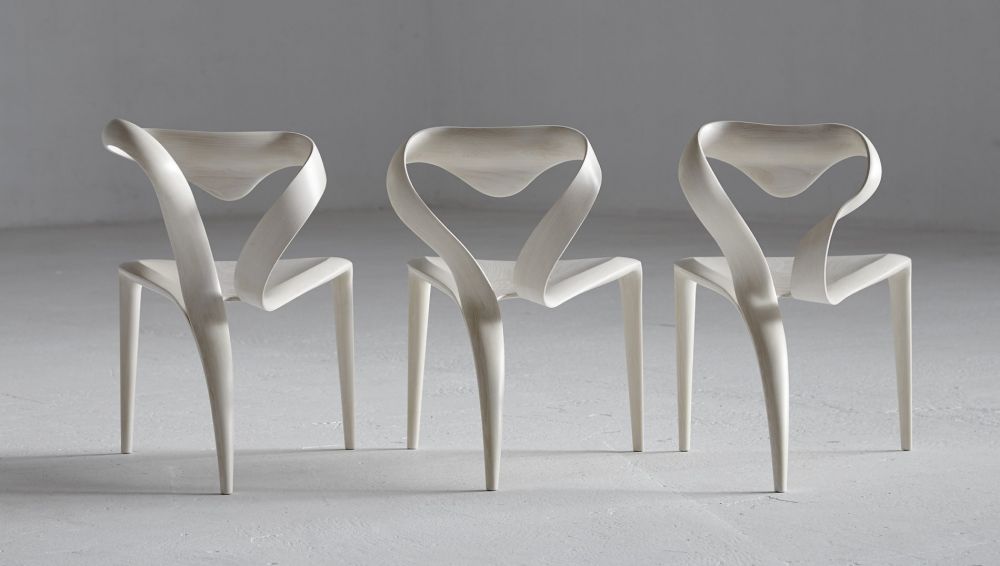 news: 8 sculptural chairs entirely made of wood | the design story
