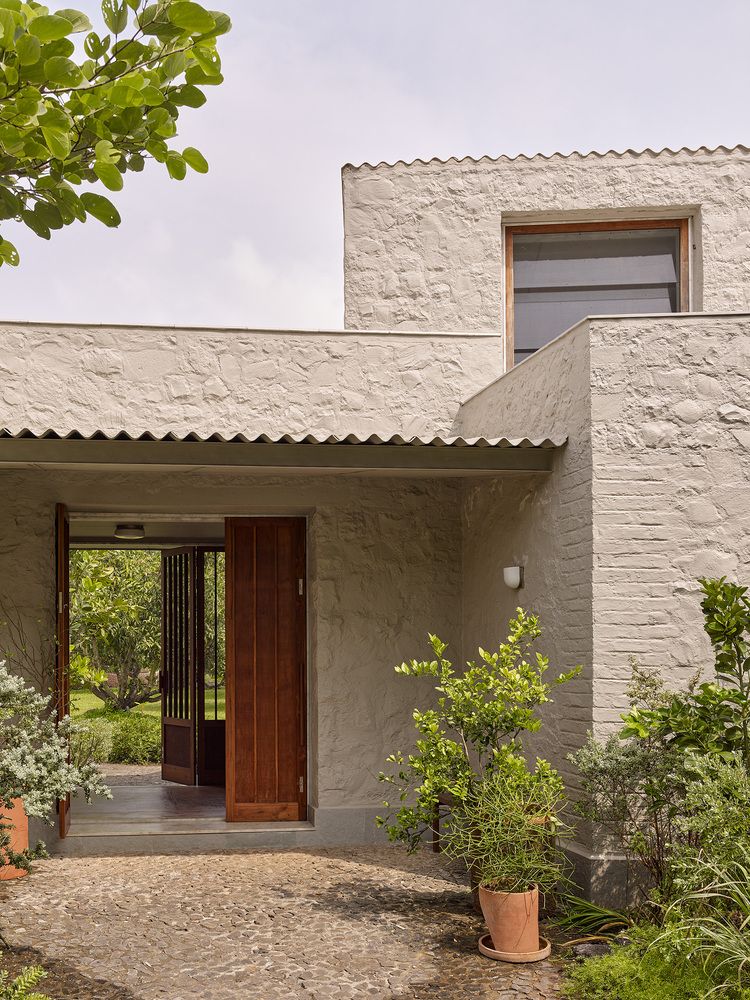 villa uma embodies a secluded tranquil oasis framed by locally sourced ...