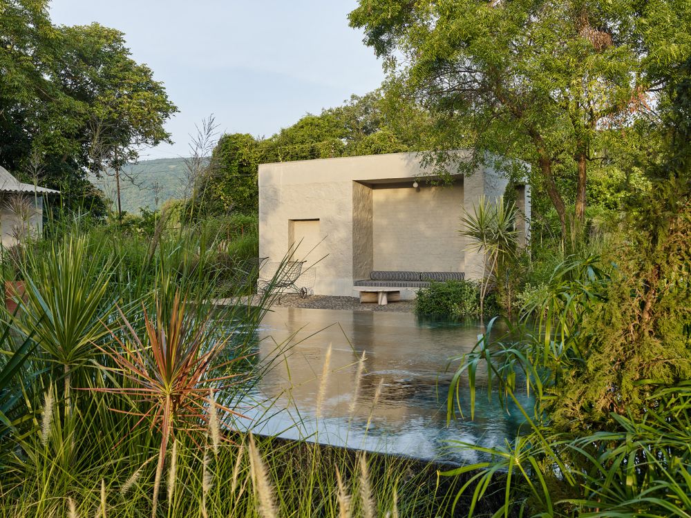 villa uma embodies a secluded tranquil oasis framed by locally sourced ...