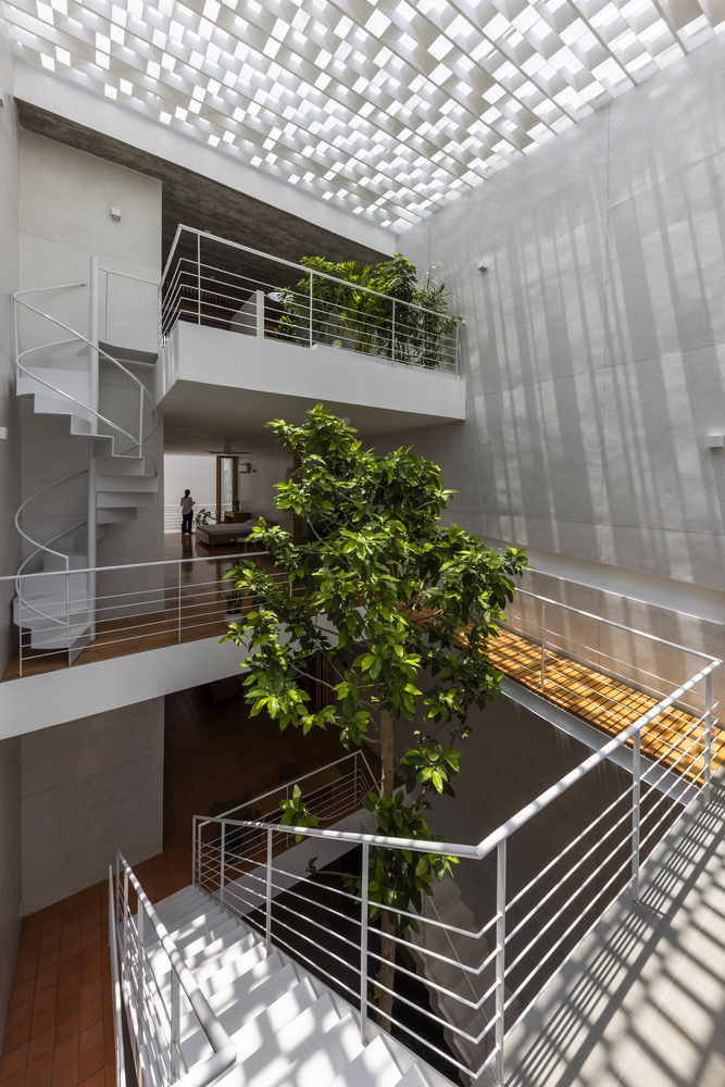 vung tau house is a multi-level tropical sanctuary embracing coastal living: project by sanuki ...