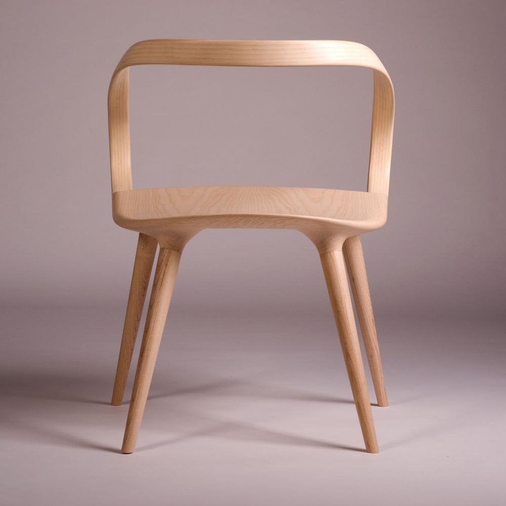 news: 8 sculptural chairs entirely made of wood | the design story