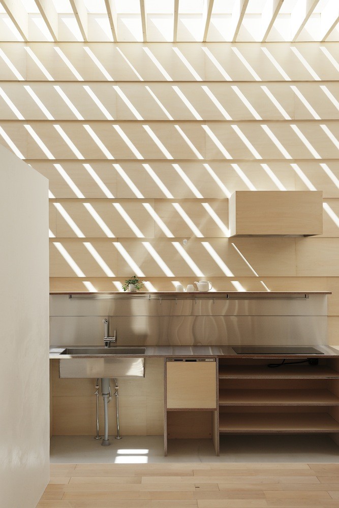 the light walls house is a compact house with natural light wonders ...