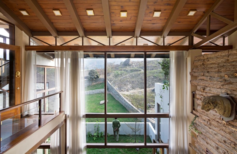 “aangan” the courtyard house creates an amalgam of introvert and ...