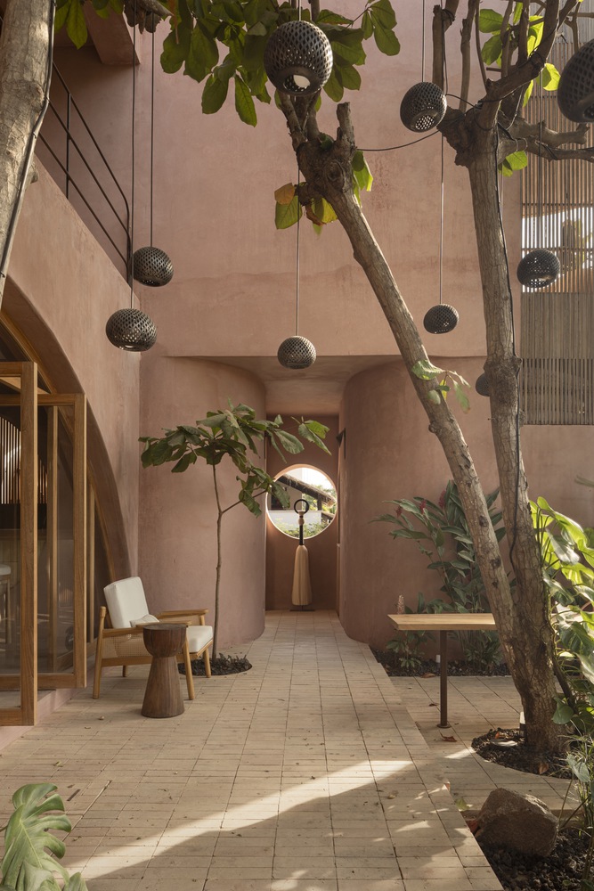 xiqué boutique hotel celebrates sustainability with earthy tones and ...
