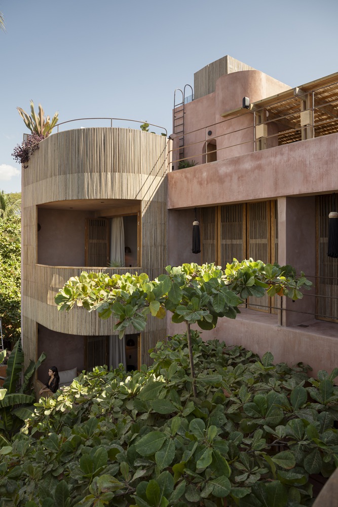 xiqué boutique hotel celebrates sustainability with earthy tones and ...