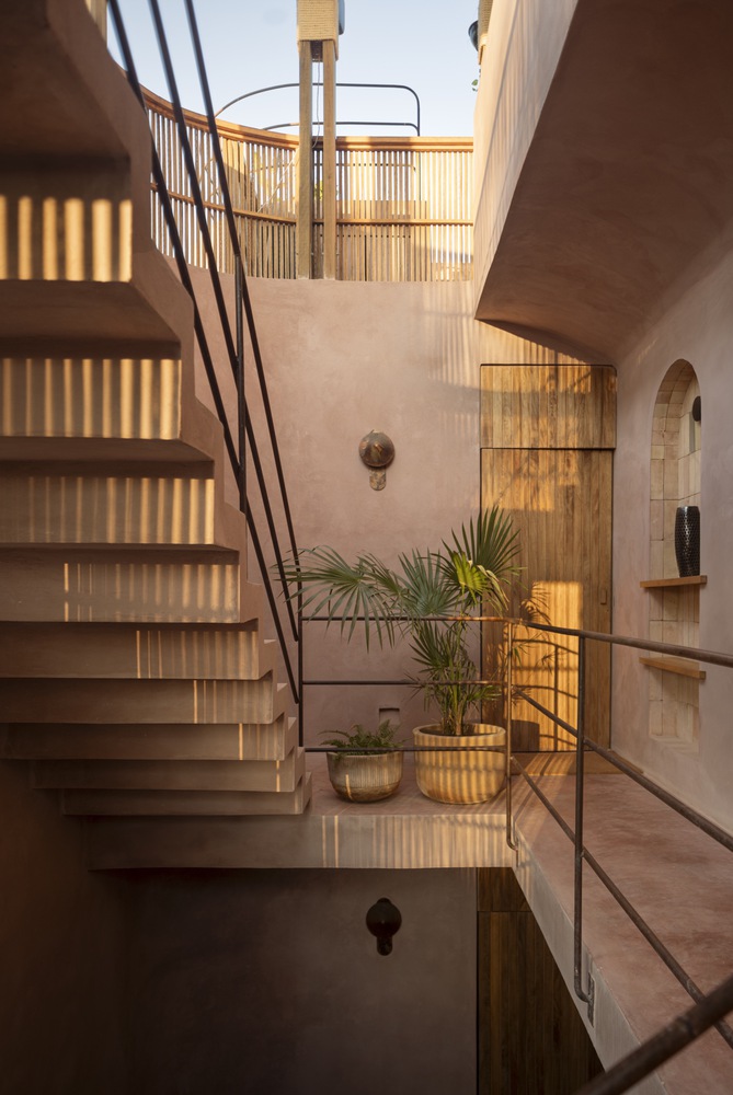 xiqué boutique hotel celebrates sustainability with earthy tones and ...